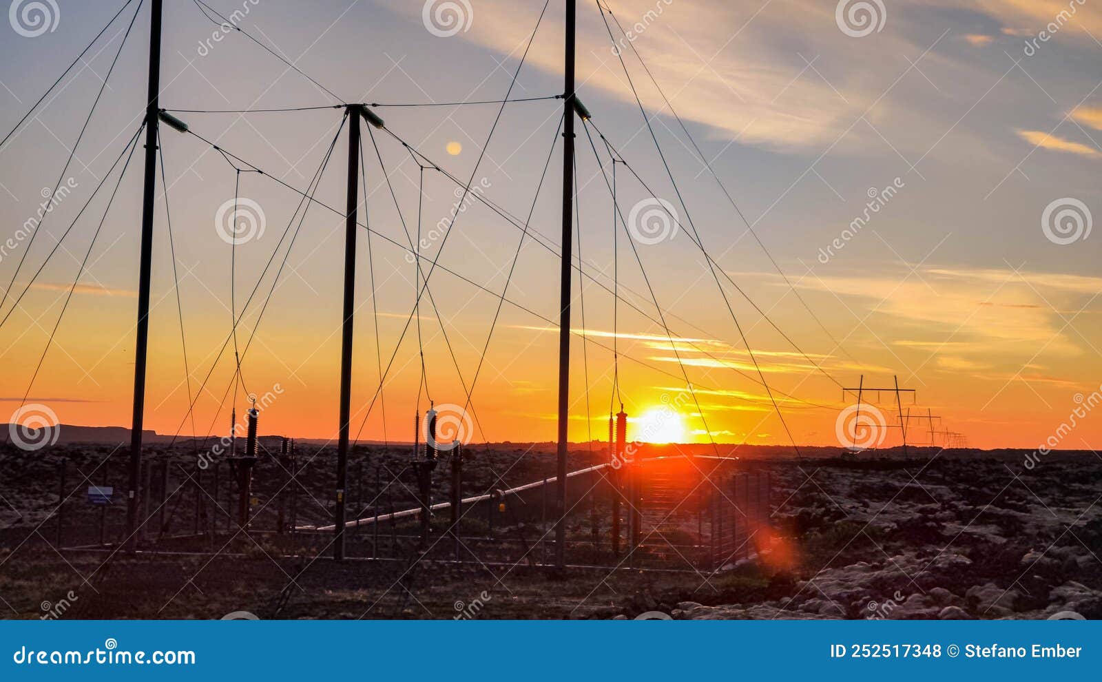 Sunset with Electric Pylons at Blue Lagoon in Iceland Stock Photo ...
