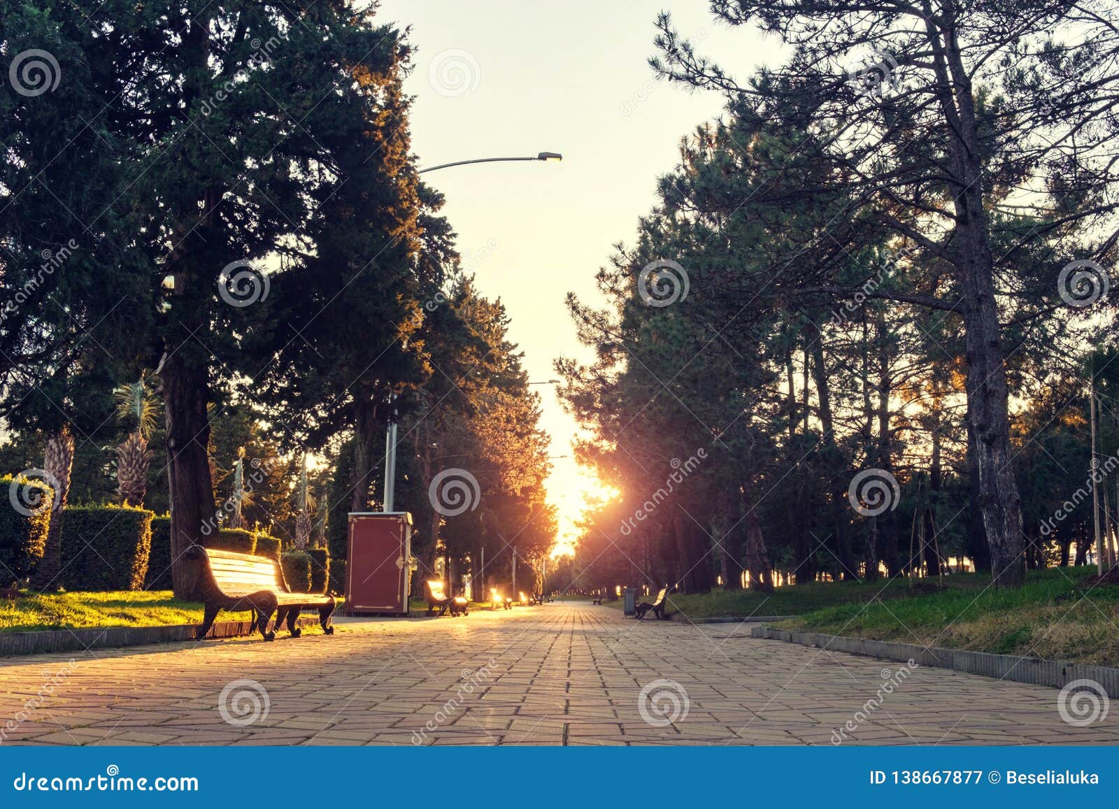 Sunset at empty alley stock image. Image of beautiful - 138667877