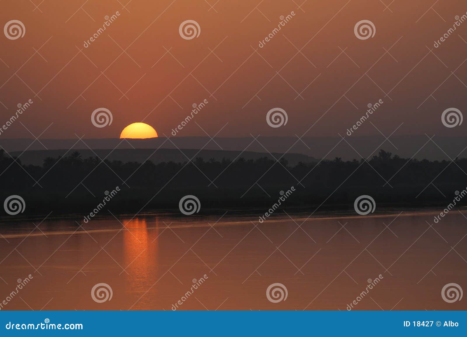 Sunset end stock image. Image of light, ocean, reflective - 18427
