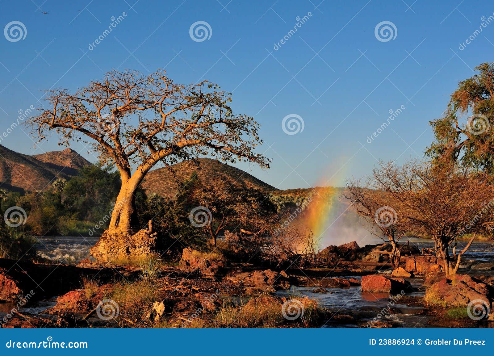 Sunset at the Epupa Waterfall, Namibia Stock Photo - Image of spray ...