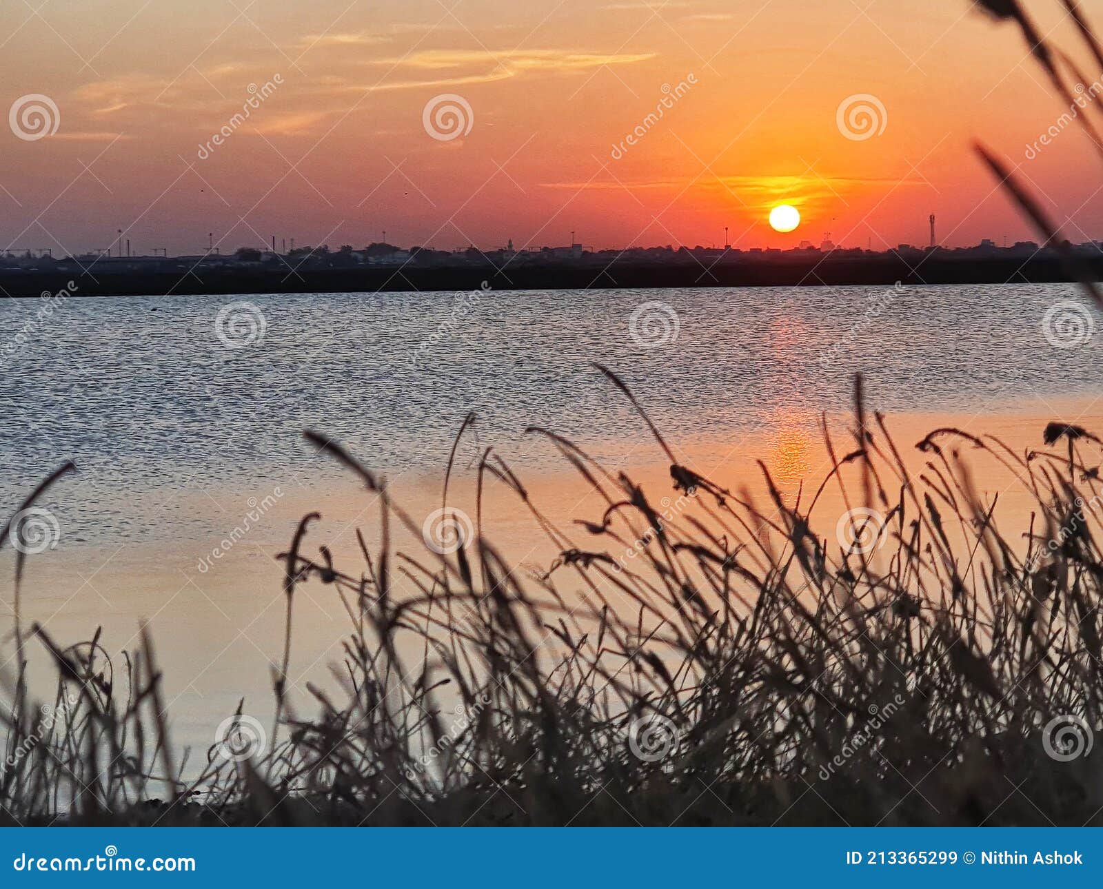 Sunset an Evening of Calmness Stock Image - Image of lake, wave: 213365299