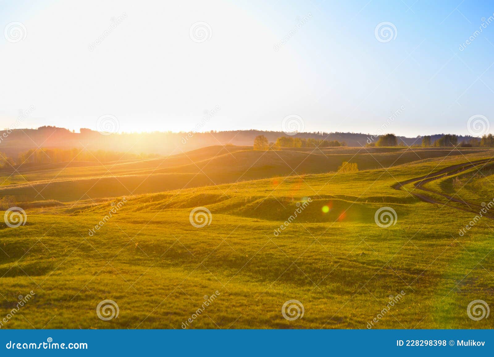 Sunset on the field. stock photo. Image of grass, cloud - 228298398