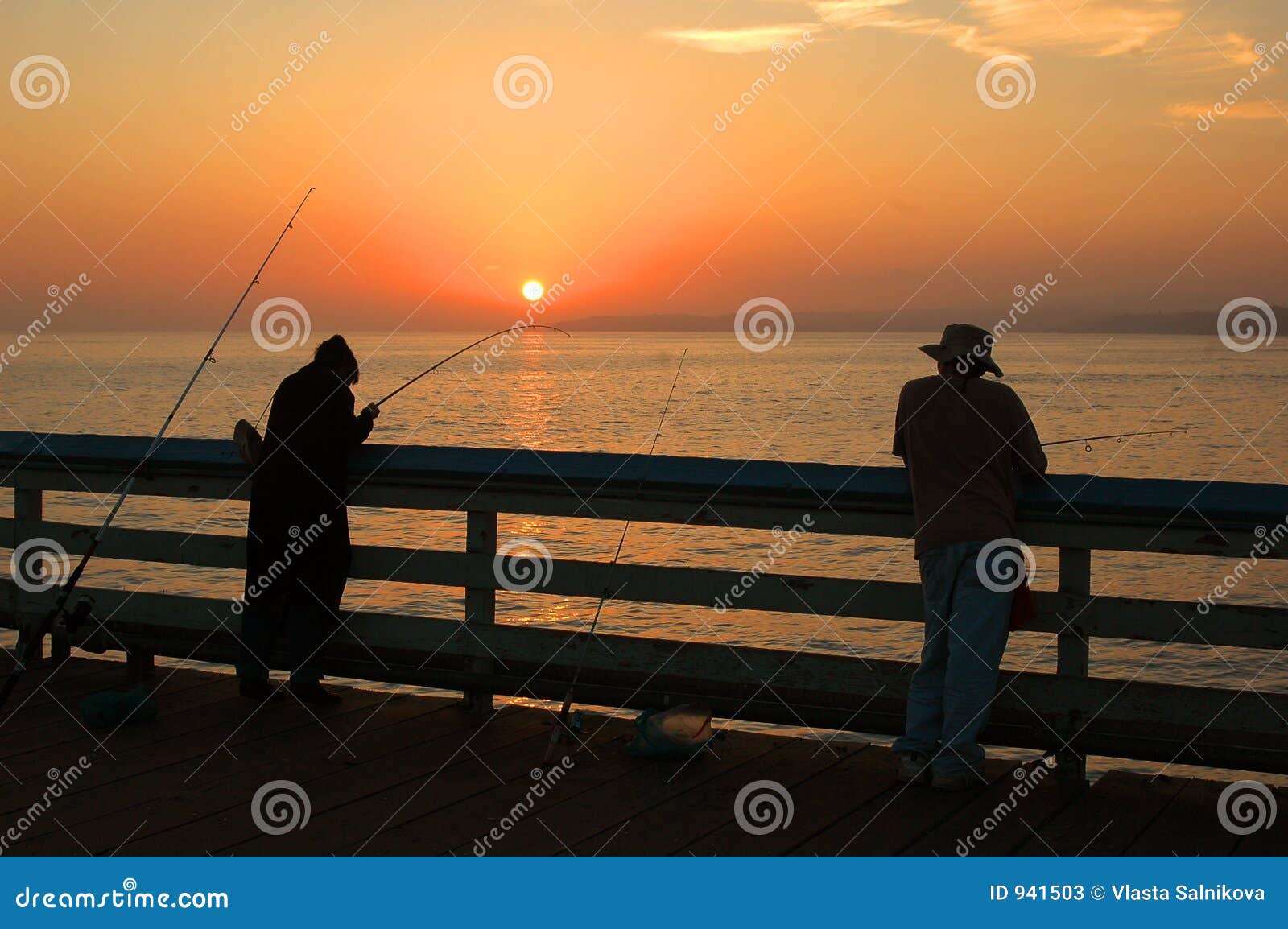 Sunset Fishing stock image. Image of woman, fisherman, clouds - 941503