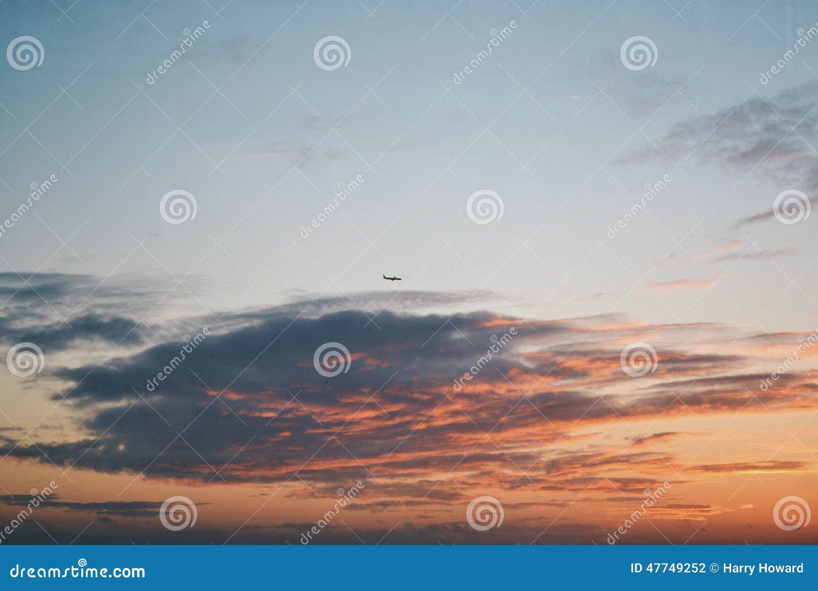 Sunset fly. stock photo. Image of clouds, sunset, colours - 47749252