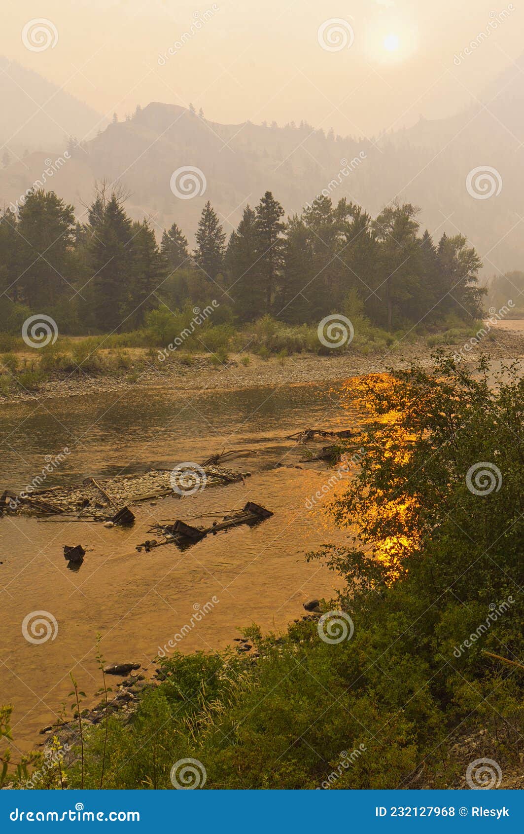 Sunset through Forest Fire Smoke Stock Photo - Image of mountain ...
