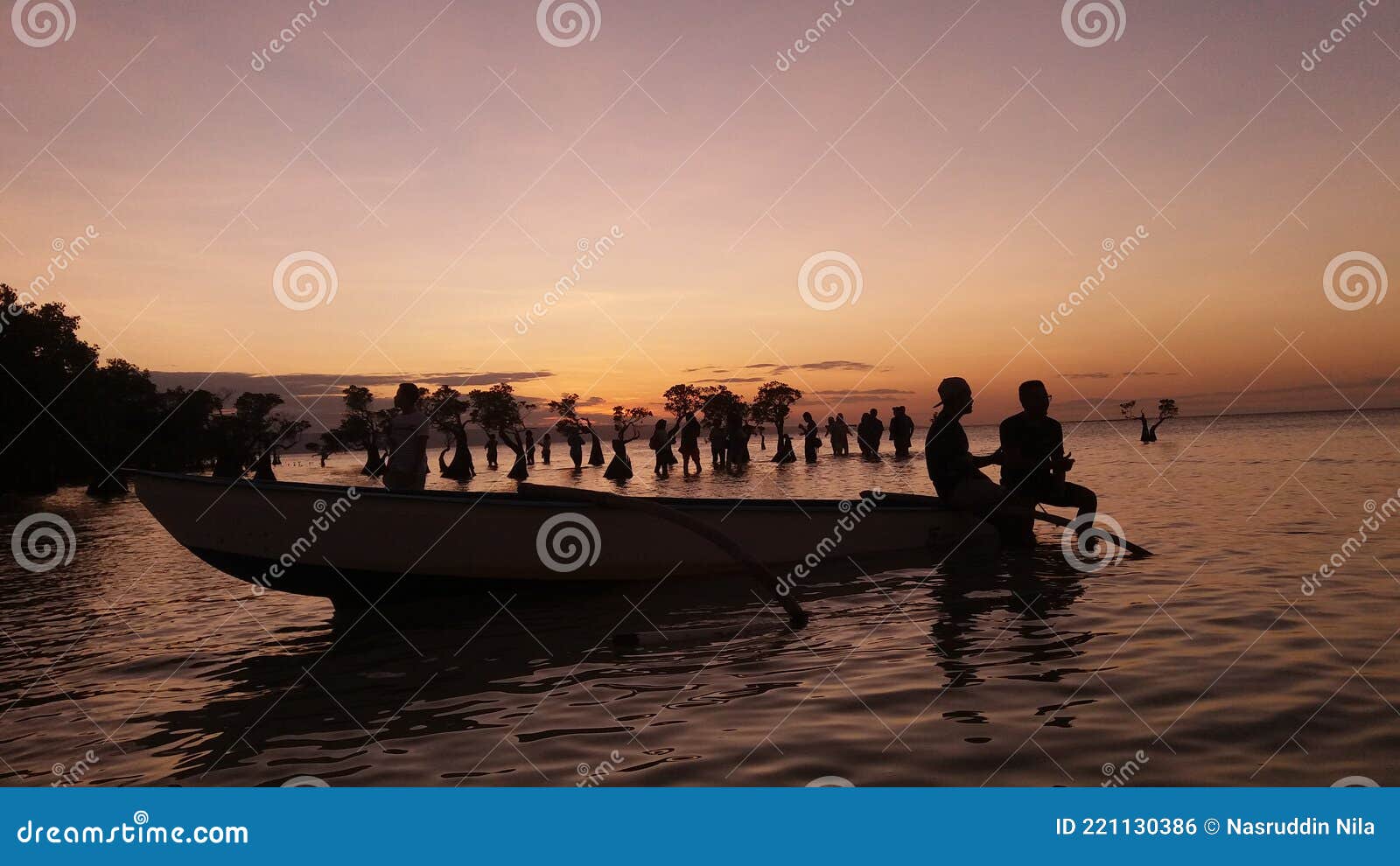 Sunset and friend stock photo. Image of sand, beach - 221130386