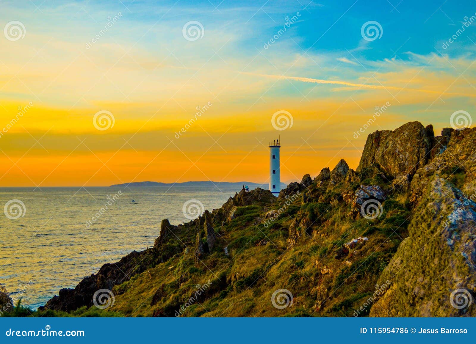 Sunset in Front of Lighthouse on the Rocks. Beautiful Scene at T Stock ...