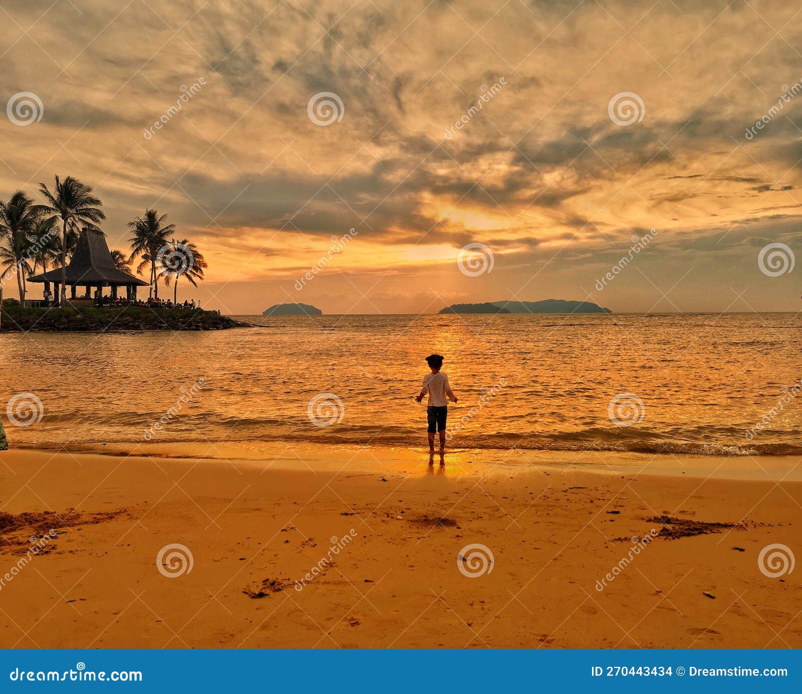 Sunset and Girl on the Beach Stock Photo - Image of sunset, evening ...