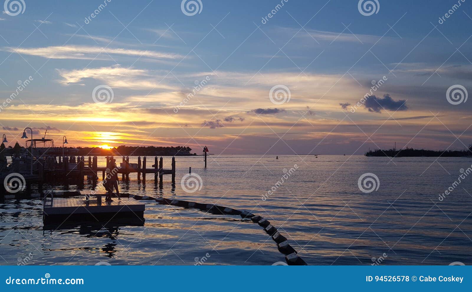 Sunset stock photo. Image of glass, water, docks, sunset - 94526578