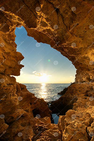 Sunset into grotto stock photo. Image of breeze, leaves - 16793900