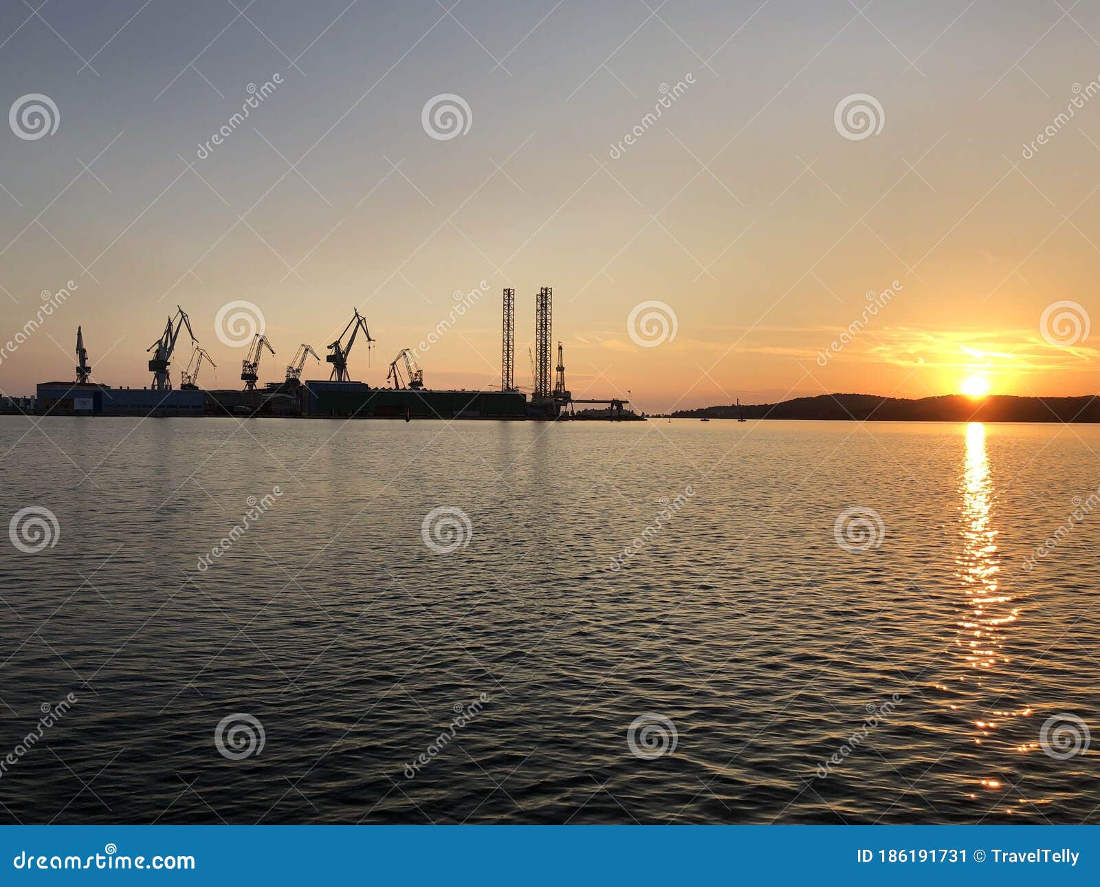 Sunset in harbor of Pula stock image. Image of sunset - 186191731