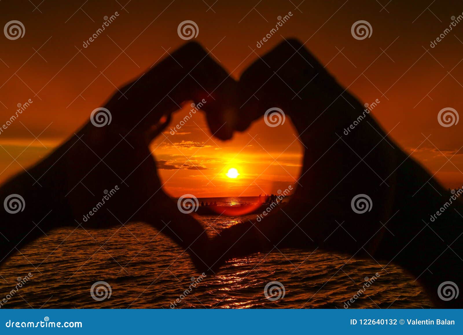 Sunset in heart hands stock photo. Image of color, heart - 122640132