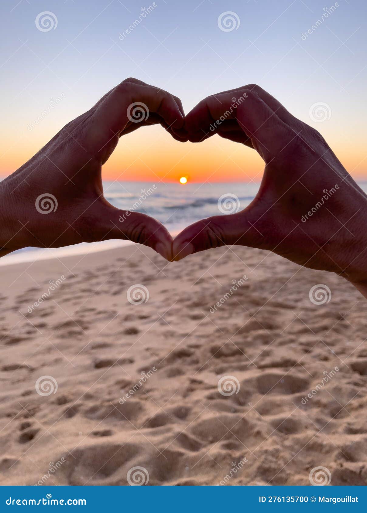 Sunset in heart hands stock photo. Image of dreamlike - 276135700