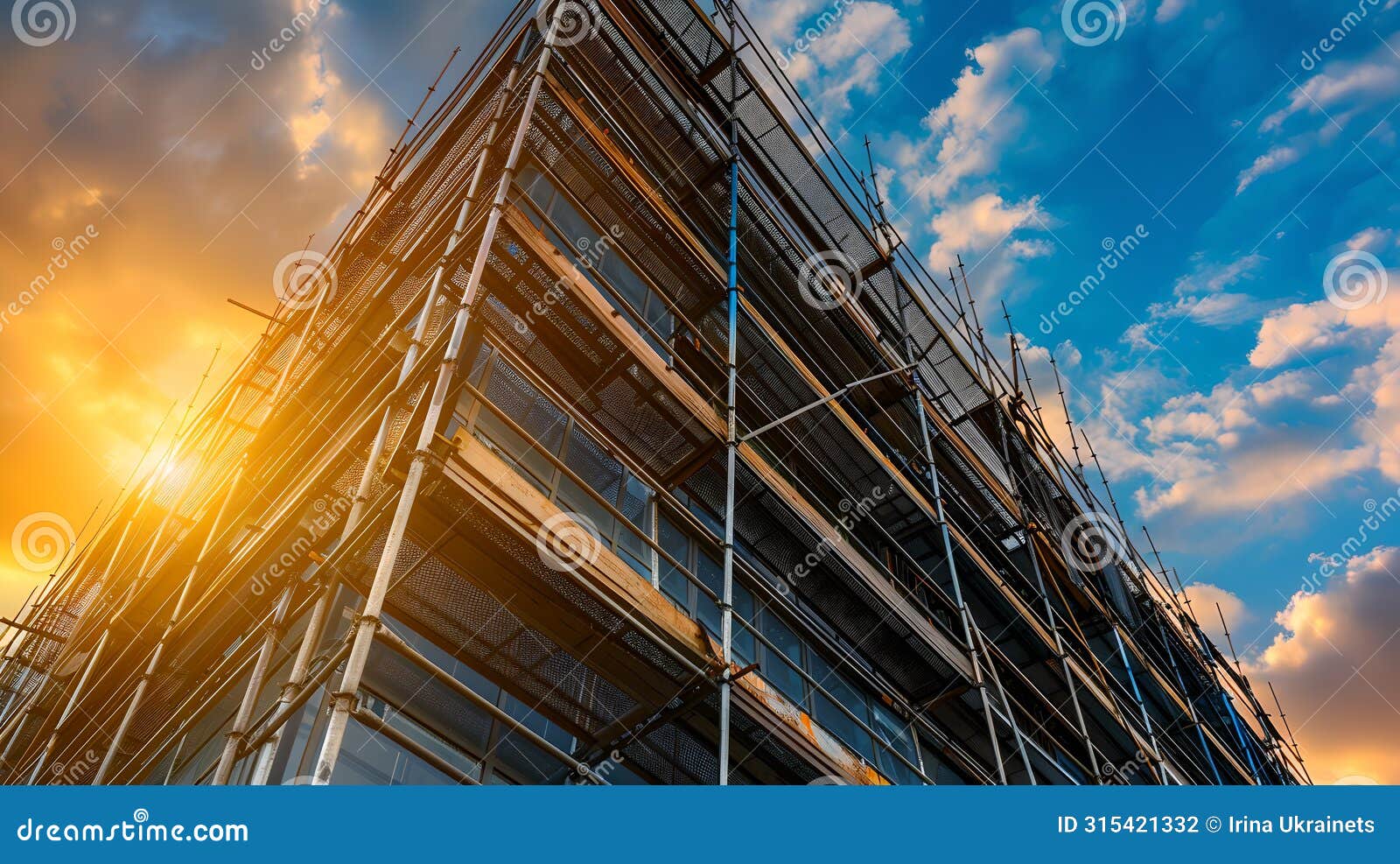Sunset Hues Gracing the Scaffolded Facade of a Building. Construction ...