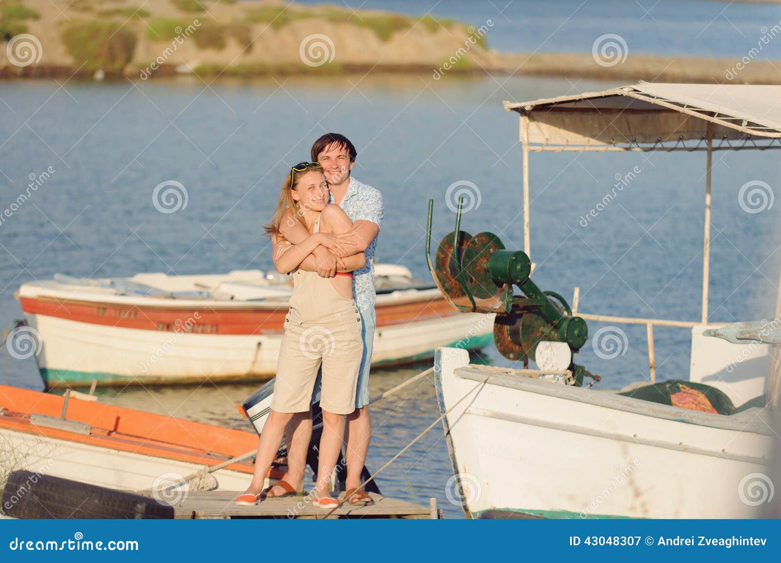Sunset Hugs stock image. Image of female, beach, couple - 43048307