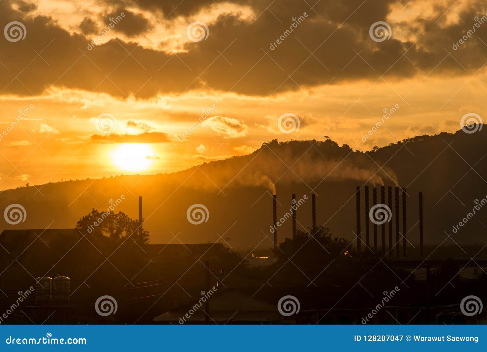 Sunset for Industrial Buildings with Smoking Pipes. Stock Image - Image ...