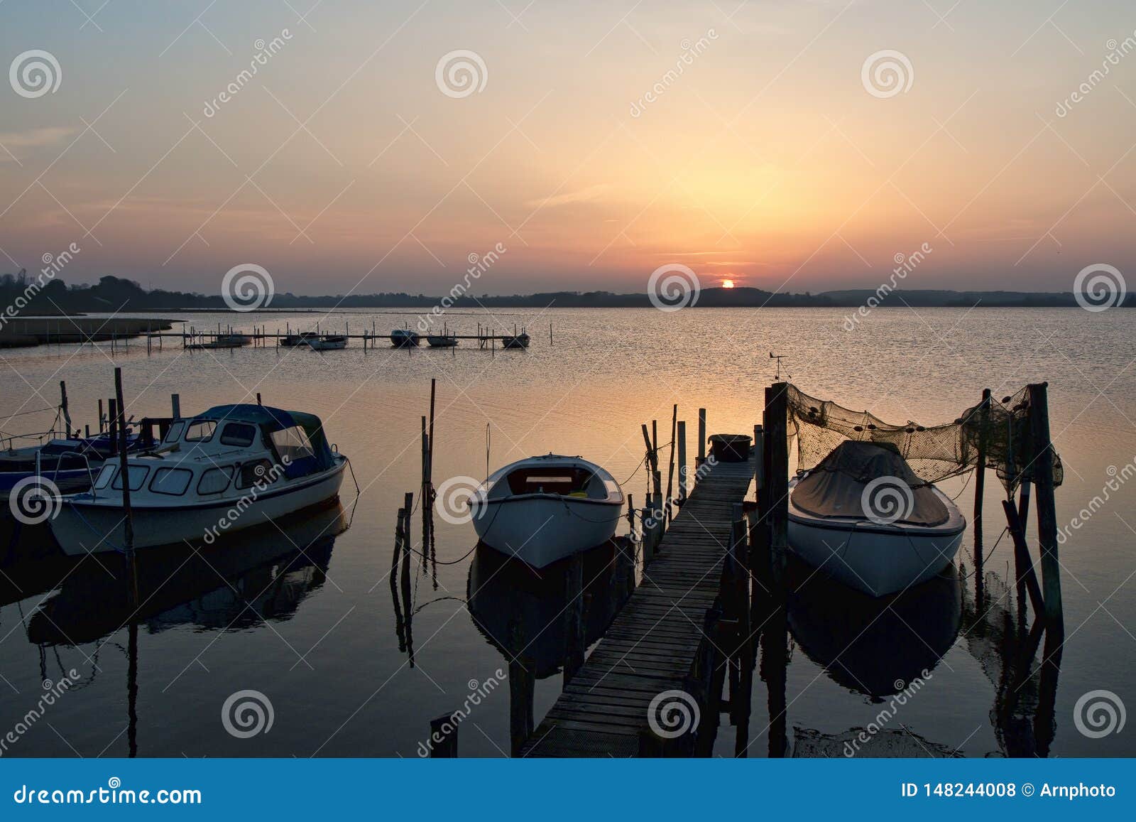 Sunset at the Inlet stock photo. Image of tourism, beach - 148244008