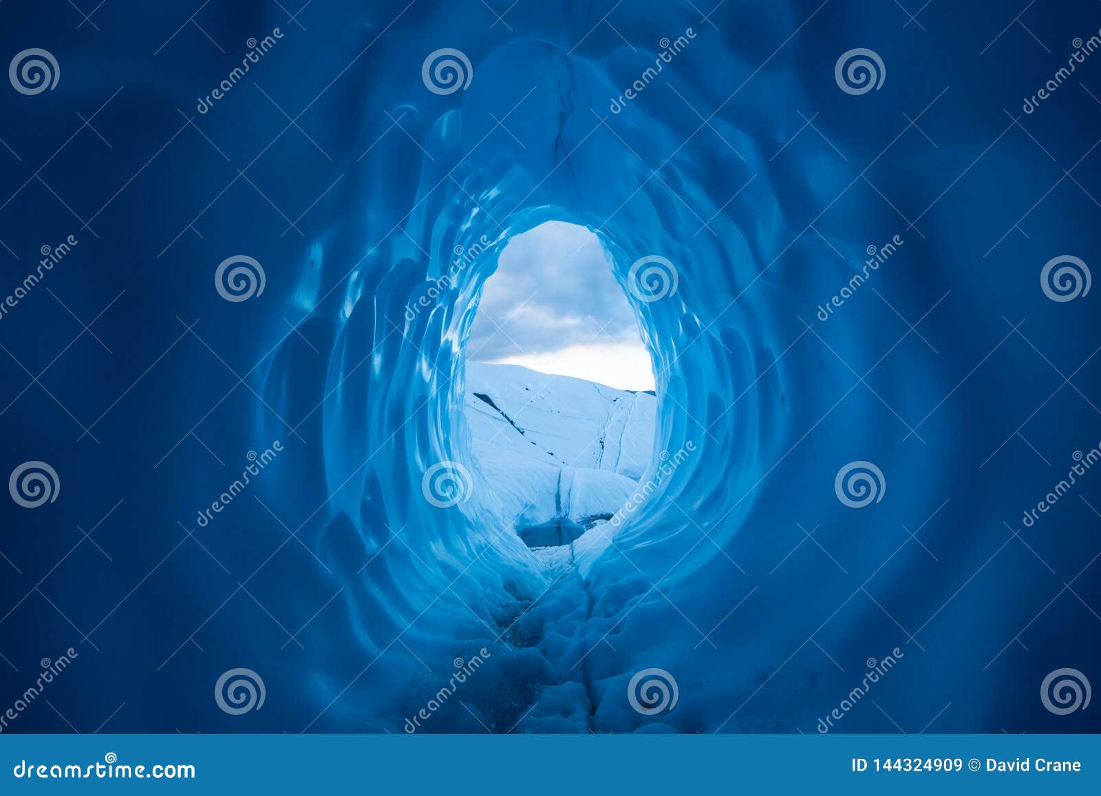 Sunset from Inside a Deep, Dark Ice Cave on the Matanuska Glacier in ...