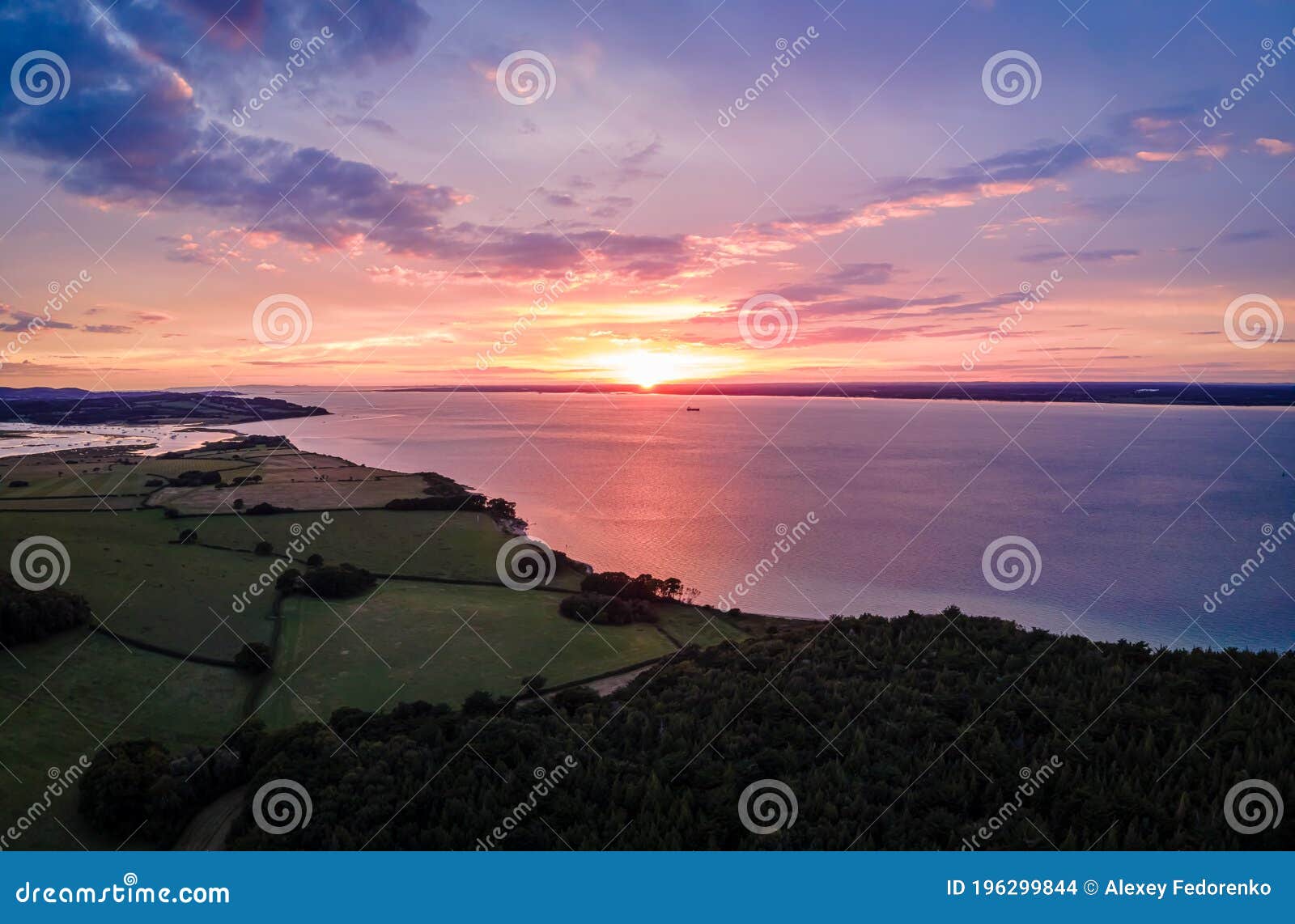 Sunset on the Isle of WIght Stock Photo - Image of landscape, blue ...