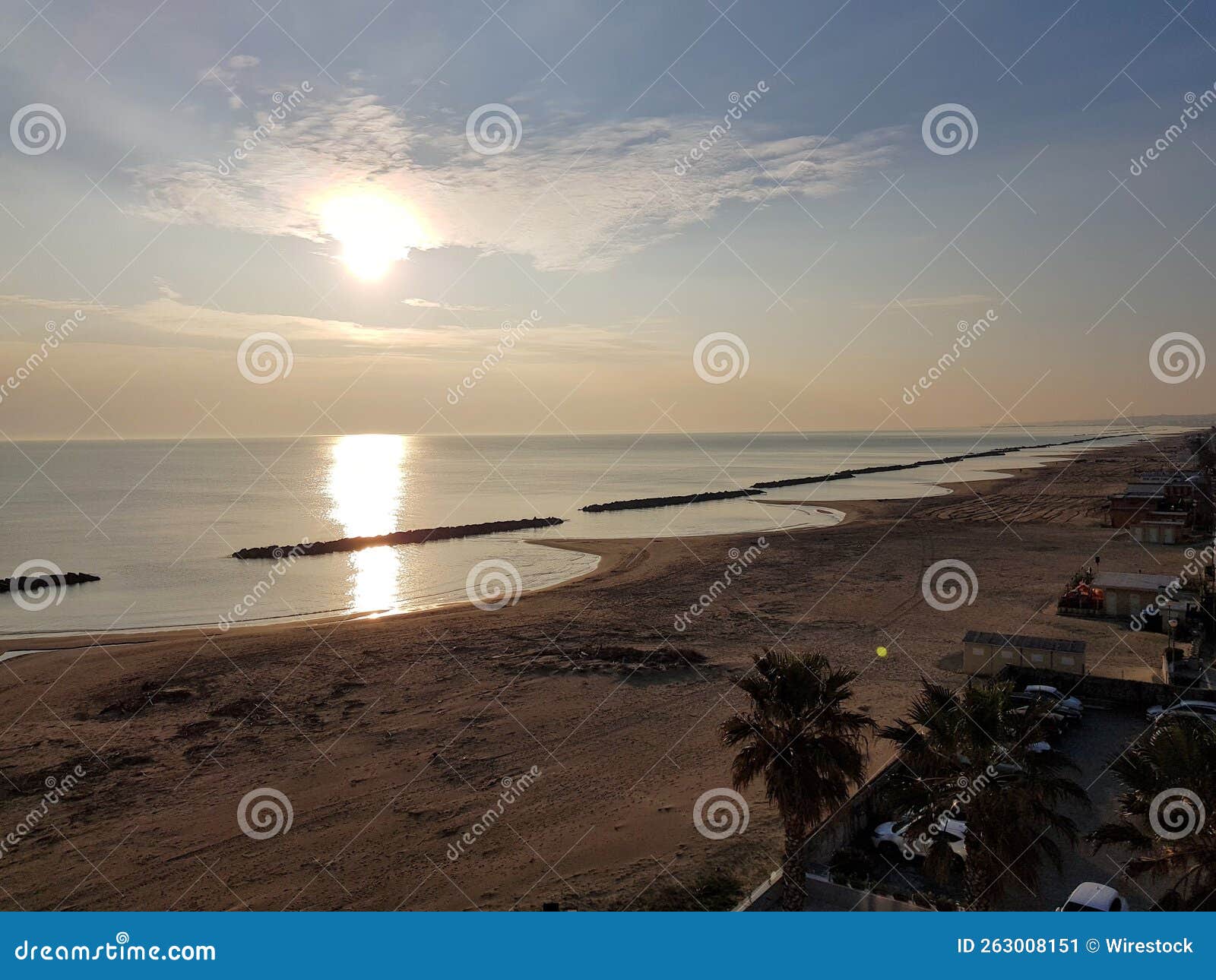 Sunset on italian beach stock image. Image of seascape - 263008151