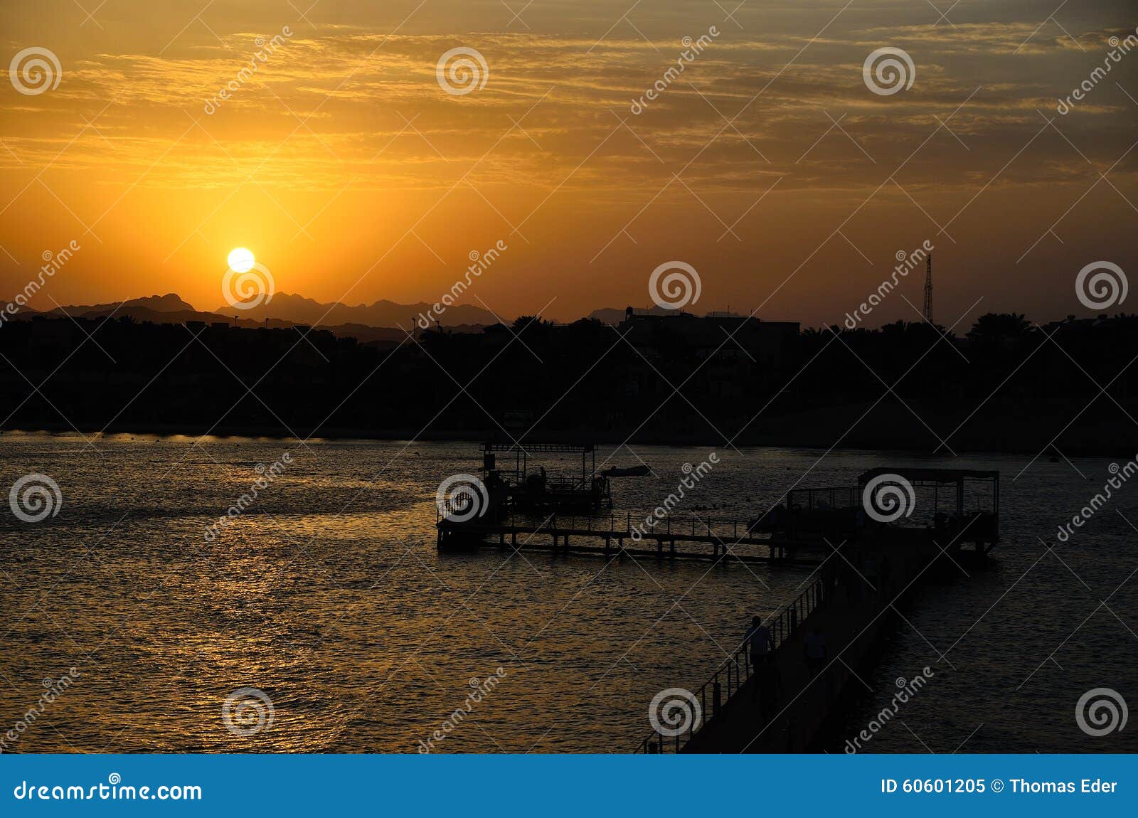 Sunset with a jetty sea stock image. Image of ocean, light - 60601205
