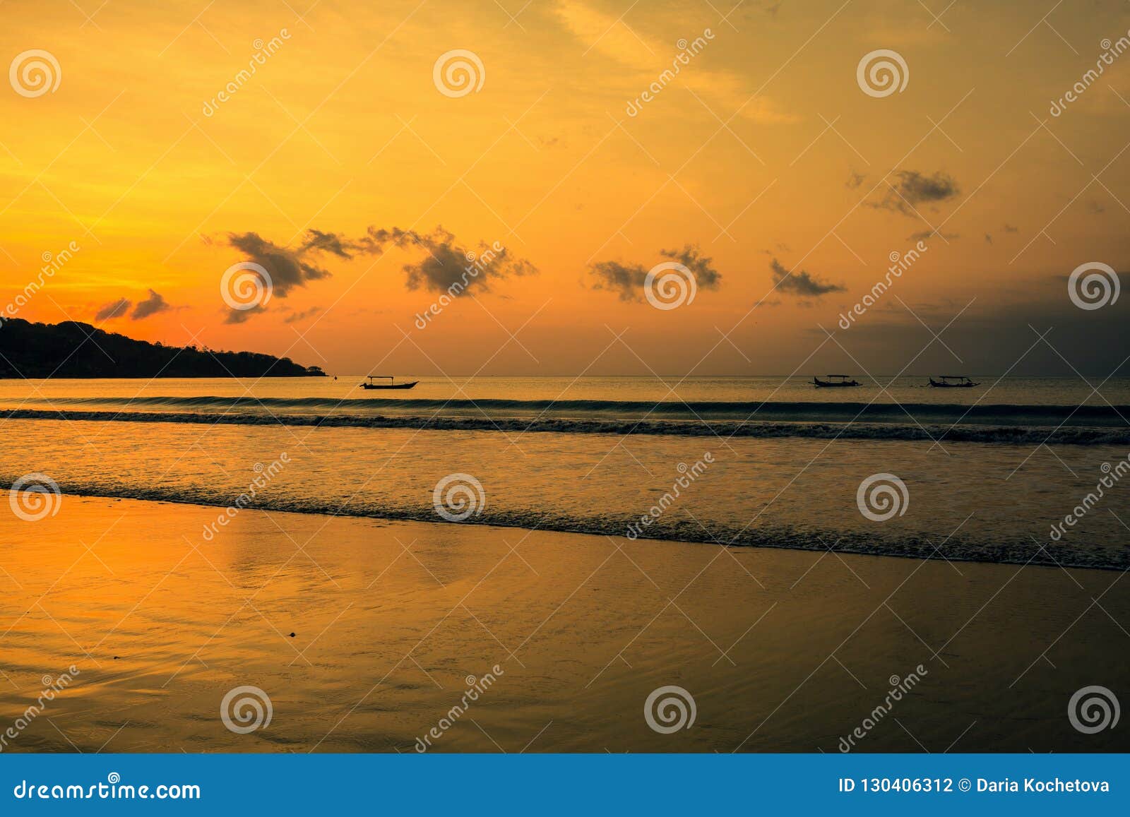 Sunset on the Jimbaran stock photo. Image of bali, gold - 130406312