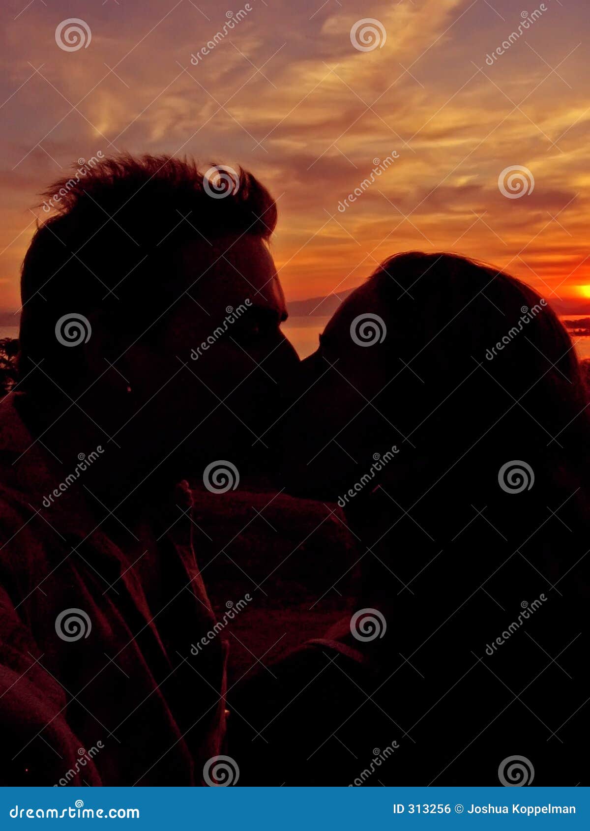 Sunset Kiss stock photo. Image of godliness, heaven, night - 313256