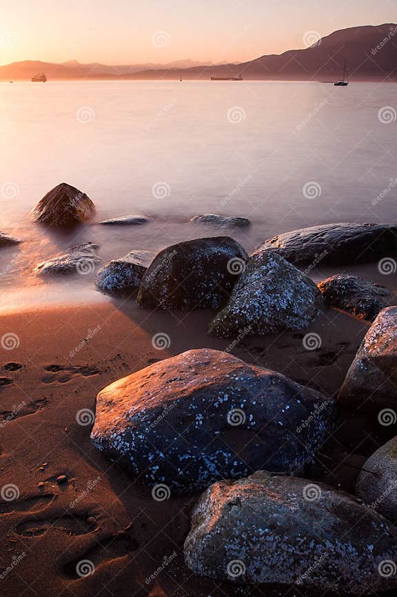Sunset at Kitsilano Beach stock image. Image of stones - 32452073
