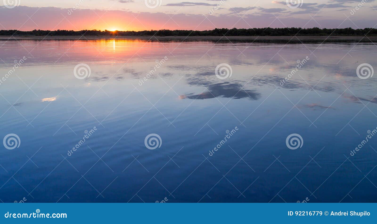 Sunset on the Lake As a Backdrop Stock Image - Image of sunset, lake ...