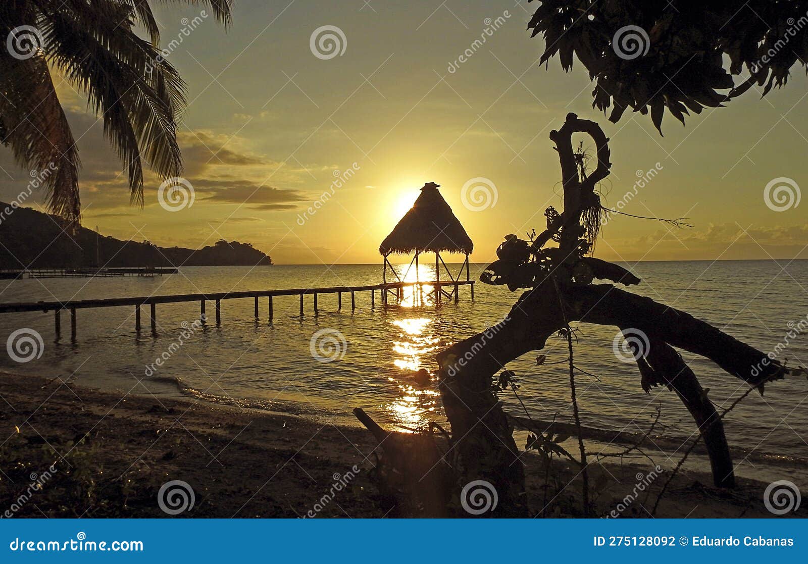 Sunset at Lake Izabal, Guatemala Stock Photo - Image of cloud, boats ...
