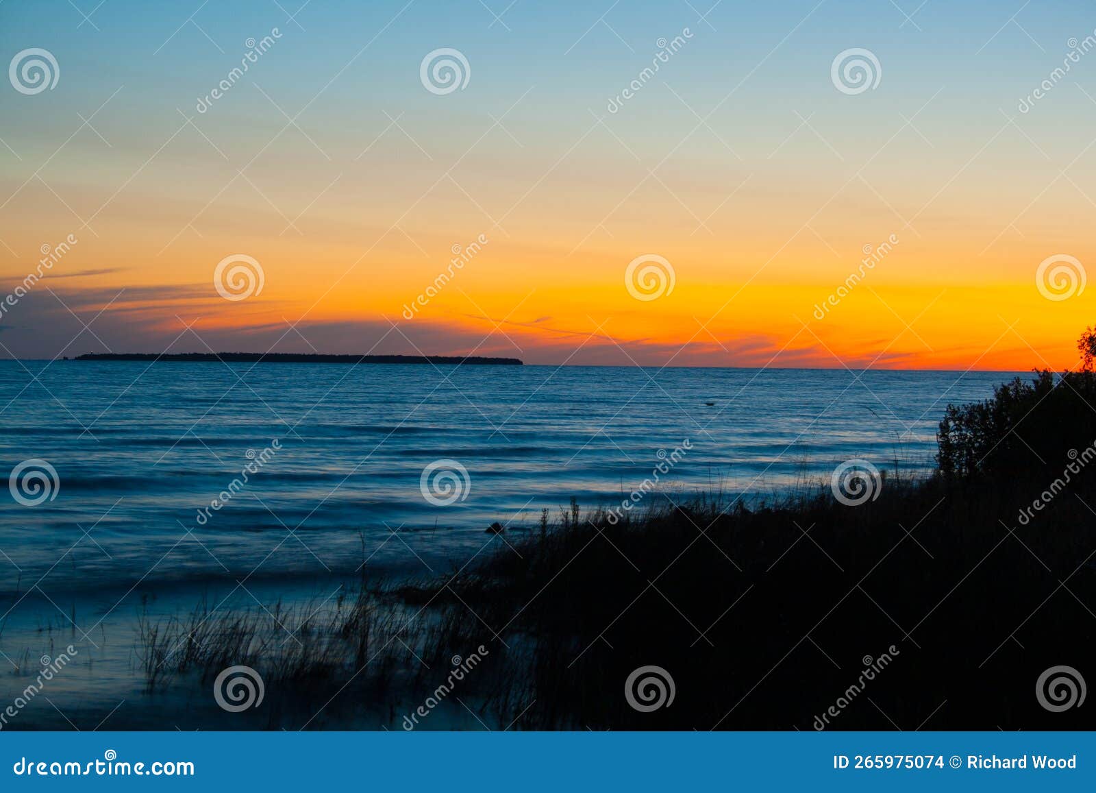 Sunset on Lake Michigan, Upper Peninsula, Michigan in Summer Stock ...