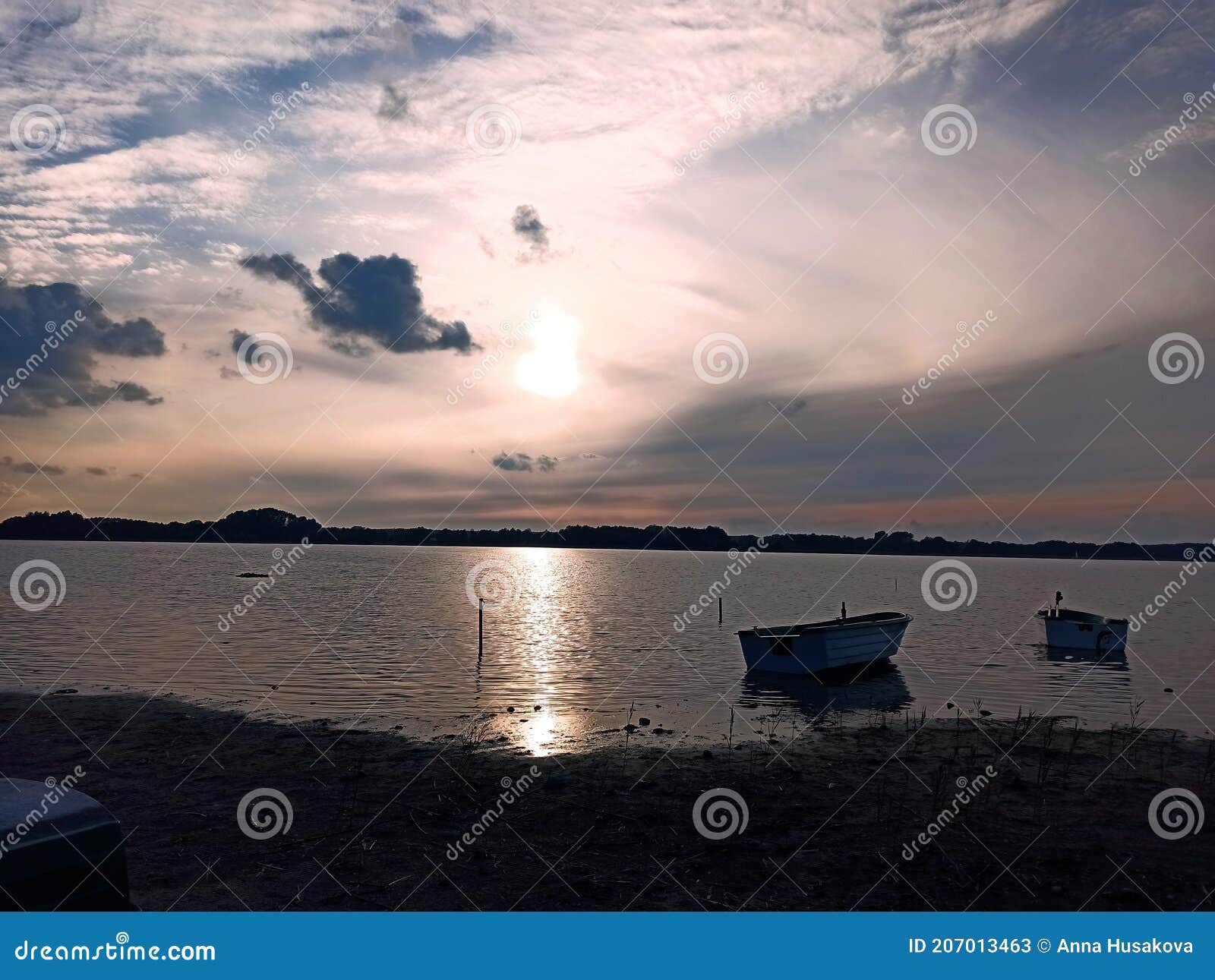 Sunset on the lake shore stock image. Image of ocean - 207013463
