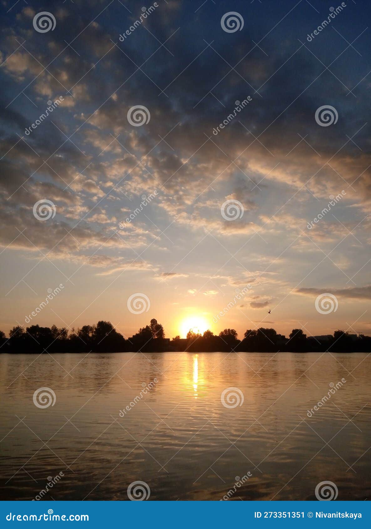 Sunset on the Lake. Smooth Water Surface, Clouds and Setting Sun. Calm ...