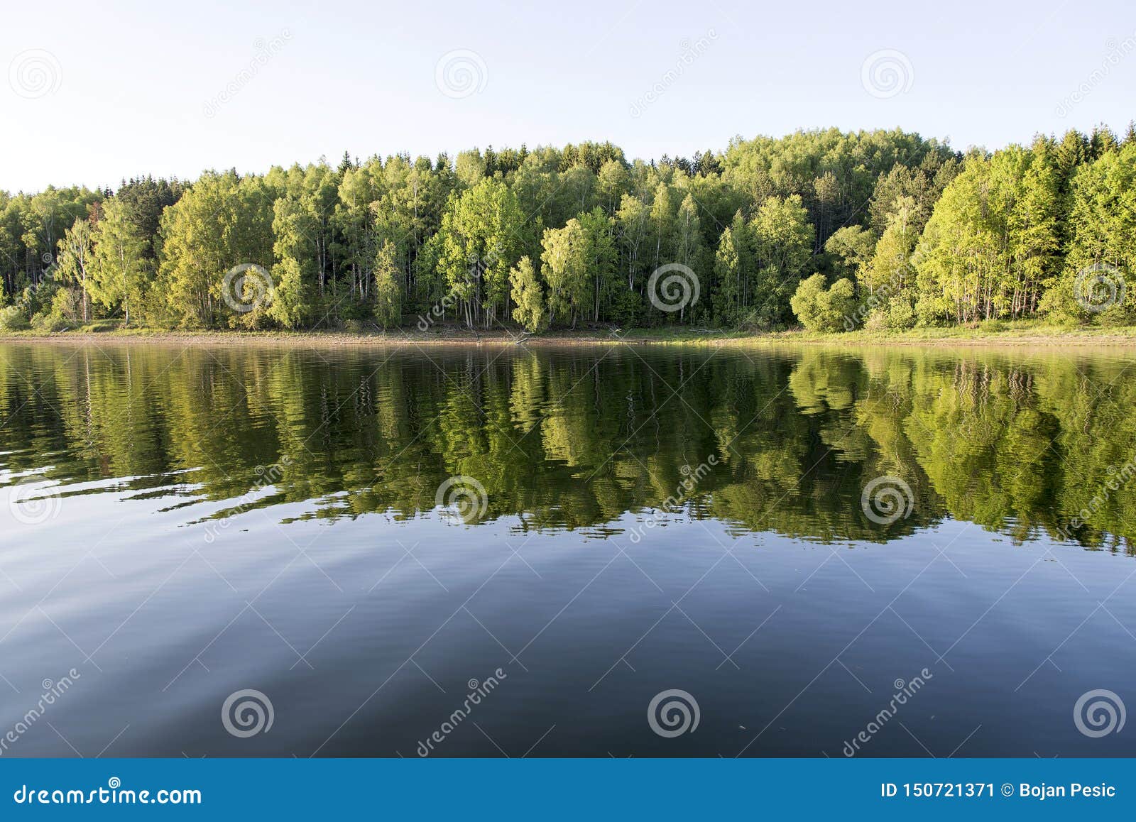 Sunset on the lake water stock image. Image of landscape - 150721371