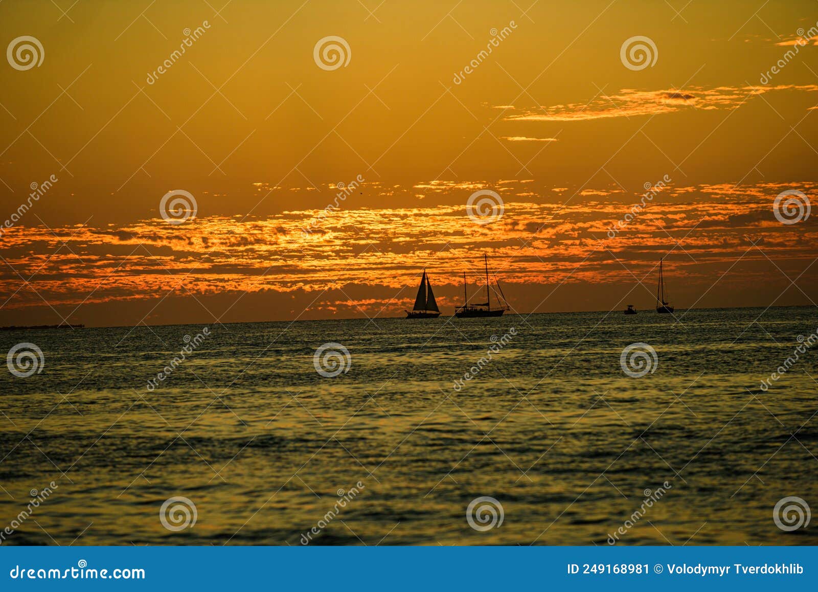 Sunset with Large Yellow Sun Under the Sea Surface. Calm Ocean with ...