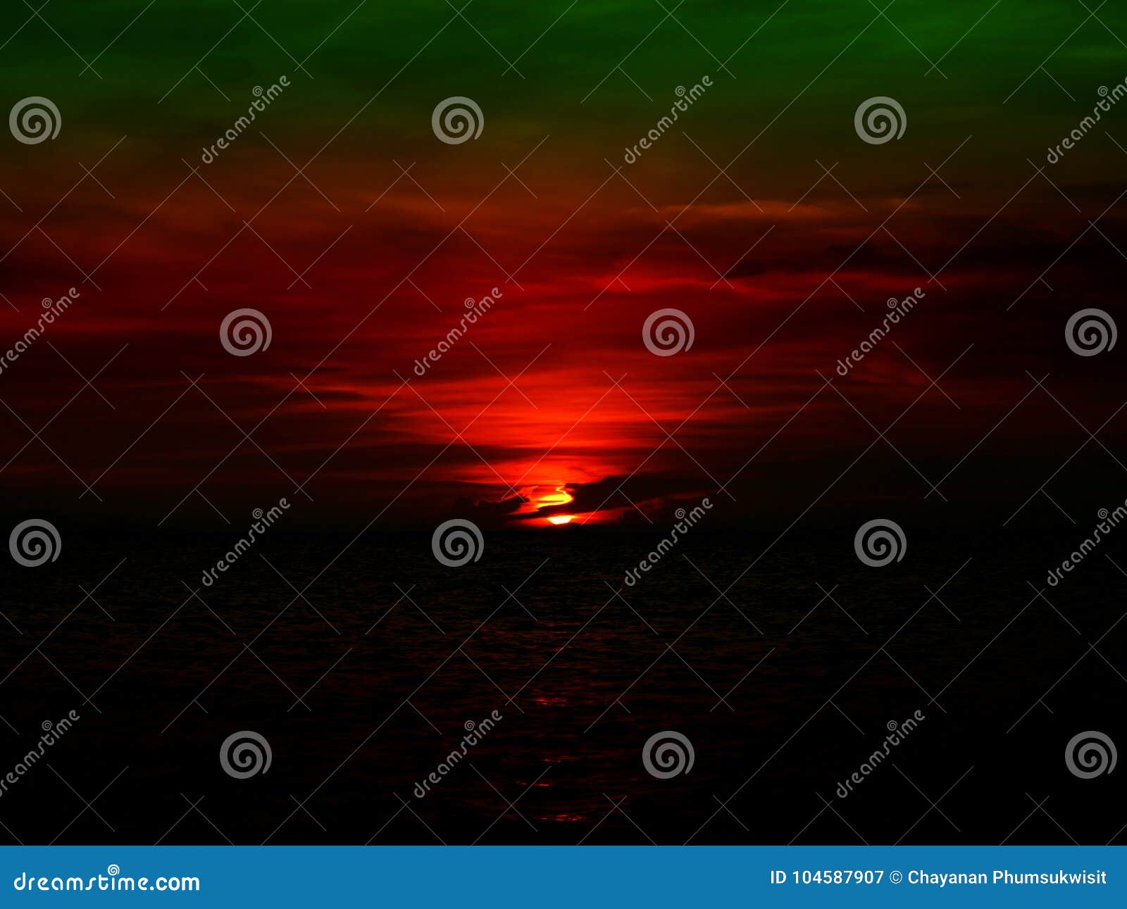 Sunset Last Light of Sun on Horizontal Line Over Dark Green Sky Stock ...