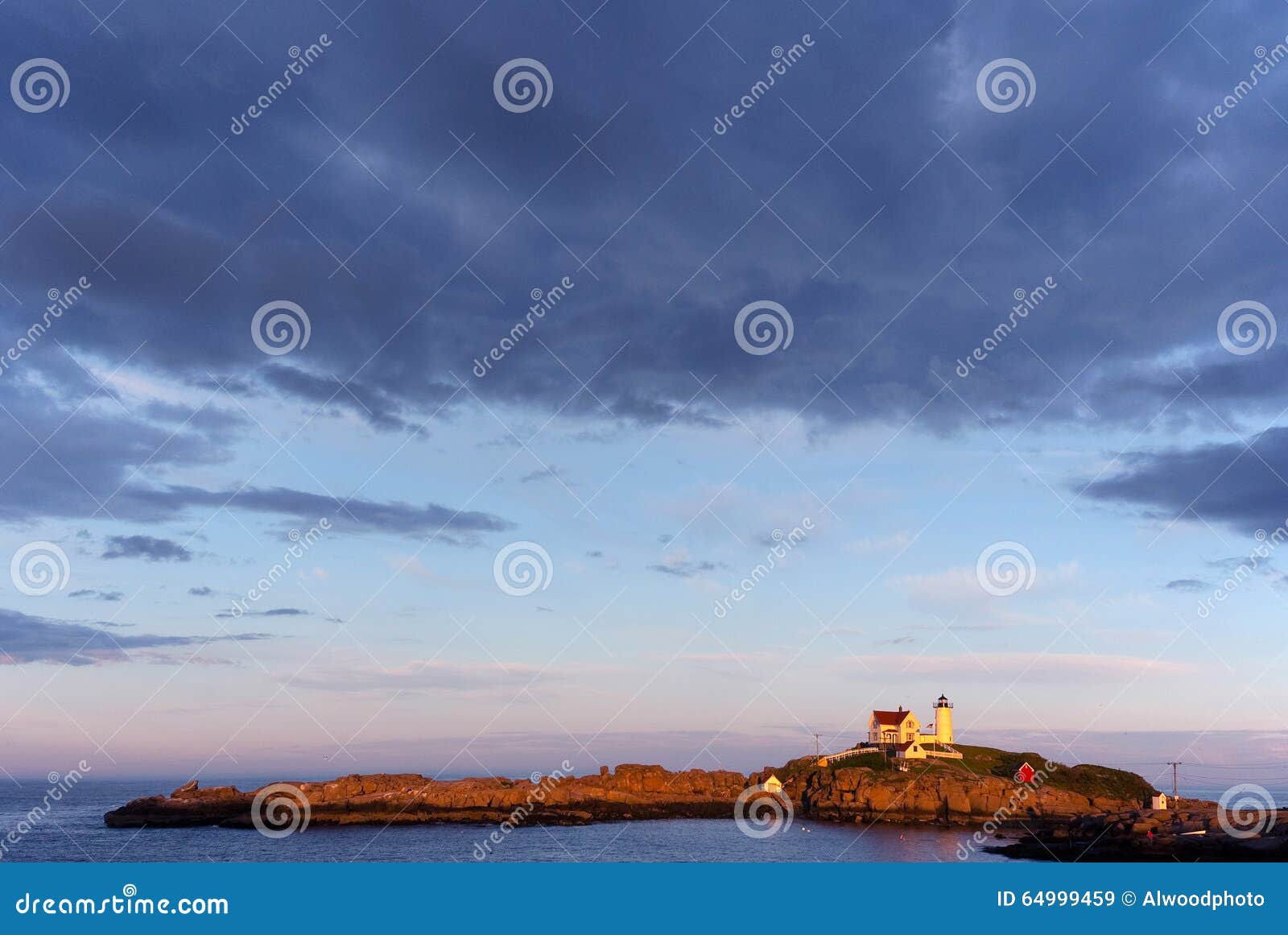 Sunset by Lighthouse As Storm Approaches Stock Image - Image of nubble ...
