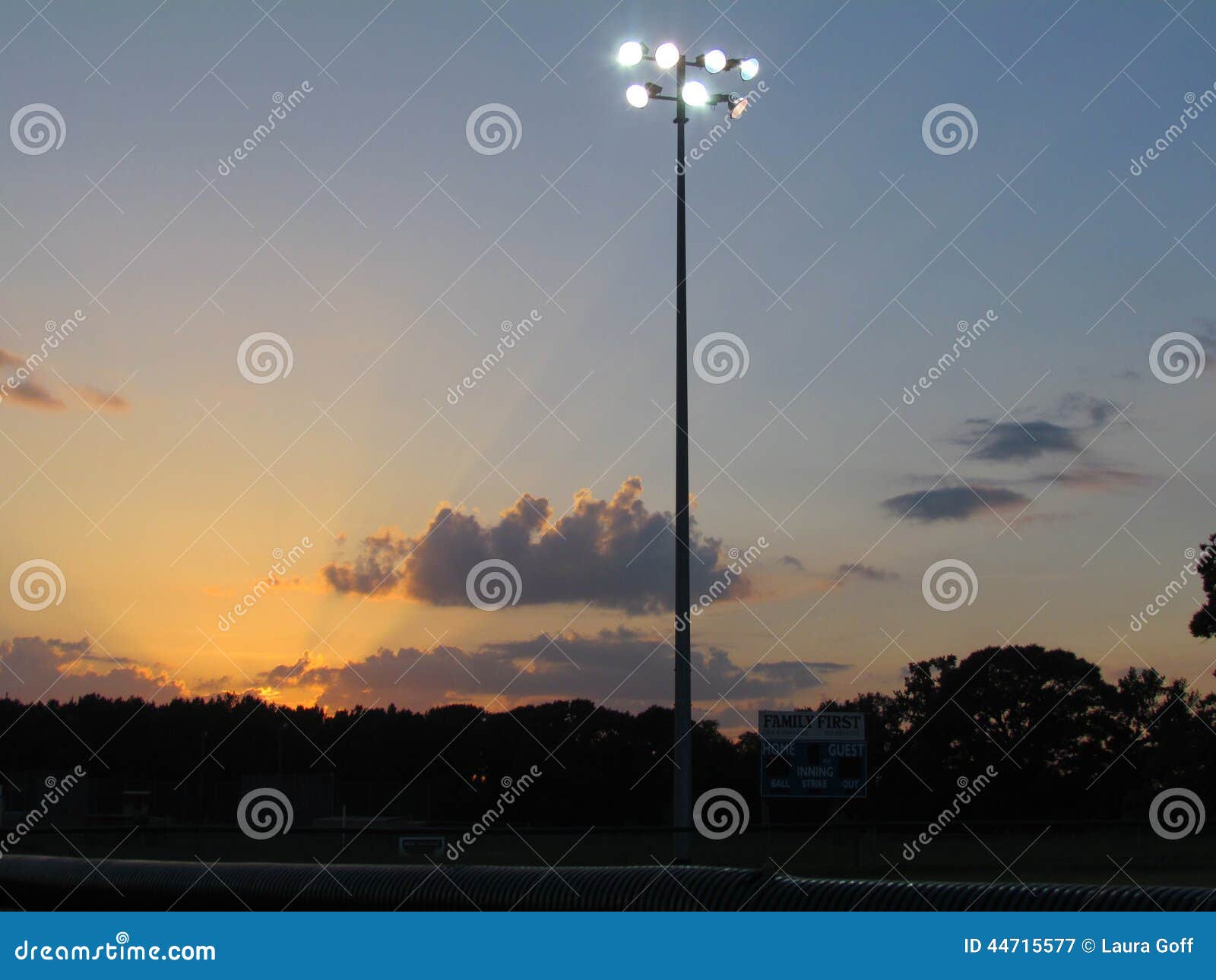 Sunset stock image. Image of orange, lights, field, blue - 44715577