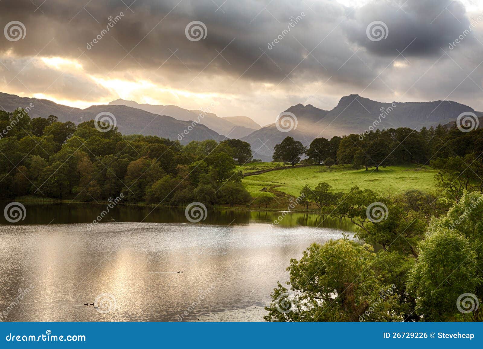 Sunset at Loughrigg Tarn in Lake District Stock Photo - Image of ...