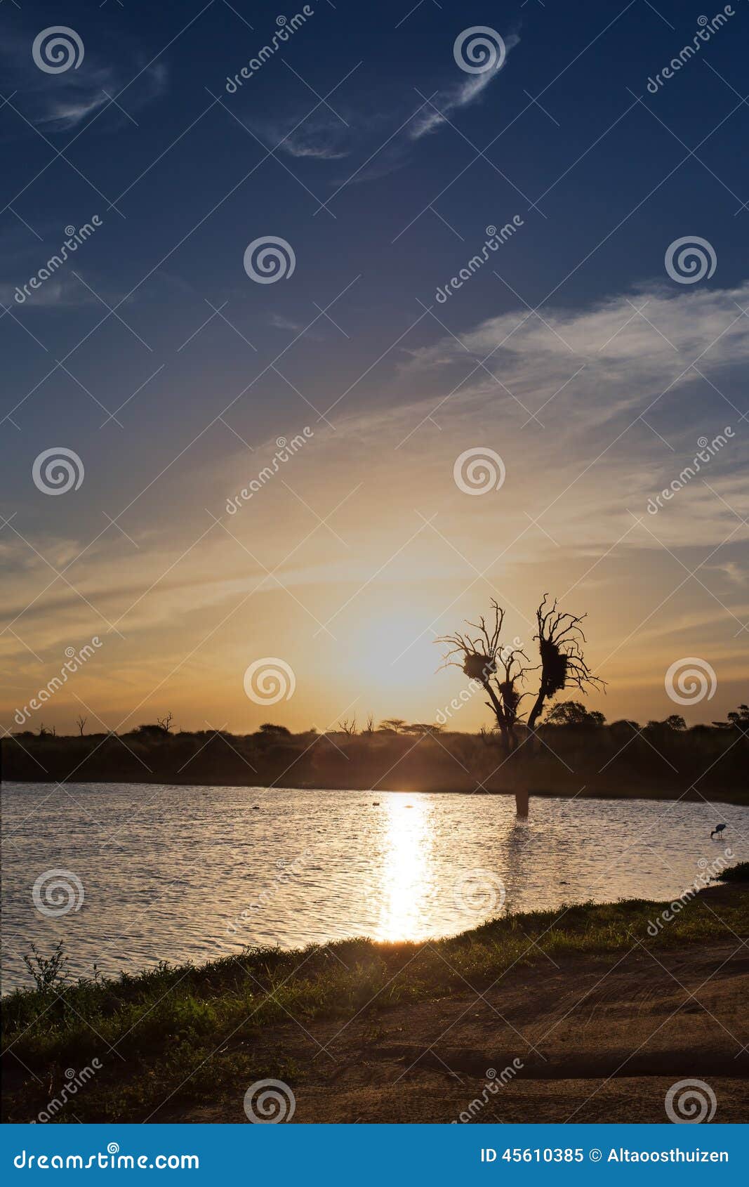 Sunset with Lovely Colours and Clouds of Tree in Lake in the Wilderness ...