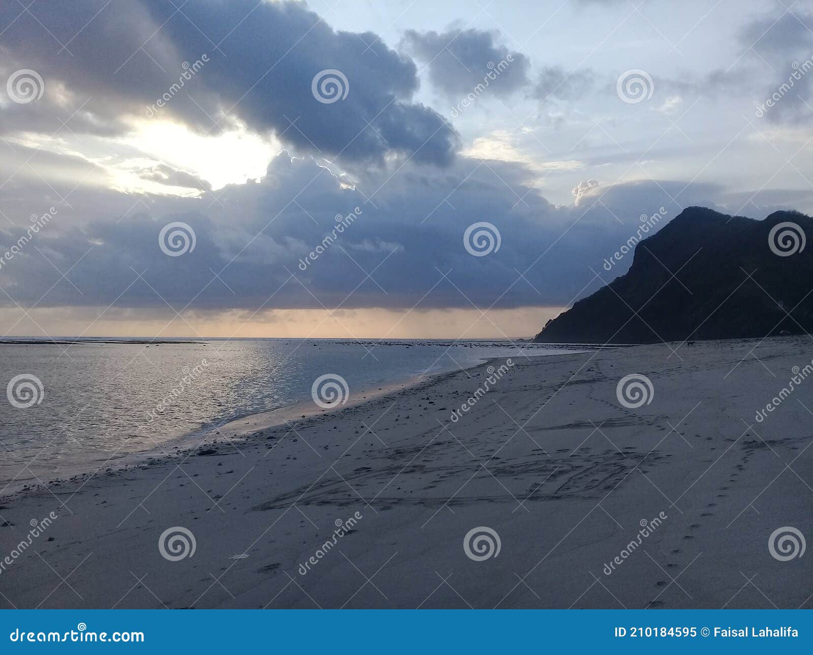 Sunset at maluk beach stock image. Image of dawn, shore - 210184595