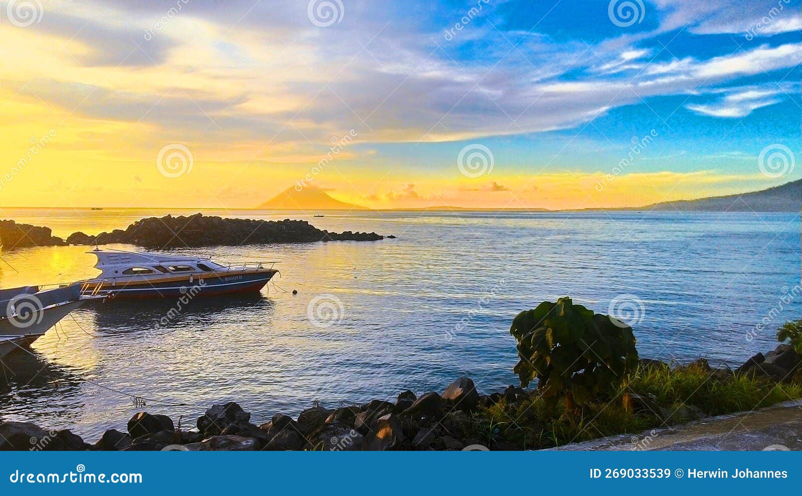 Sunset at Manado stock image. Image of sunset, evening - 269033539