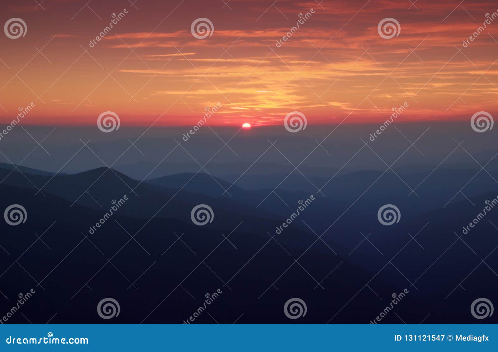 Sunset with Mountain Silhouettes in Mist Shadow Stock Image - Image of ...