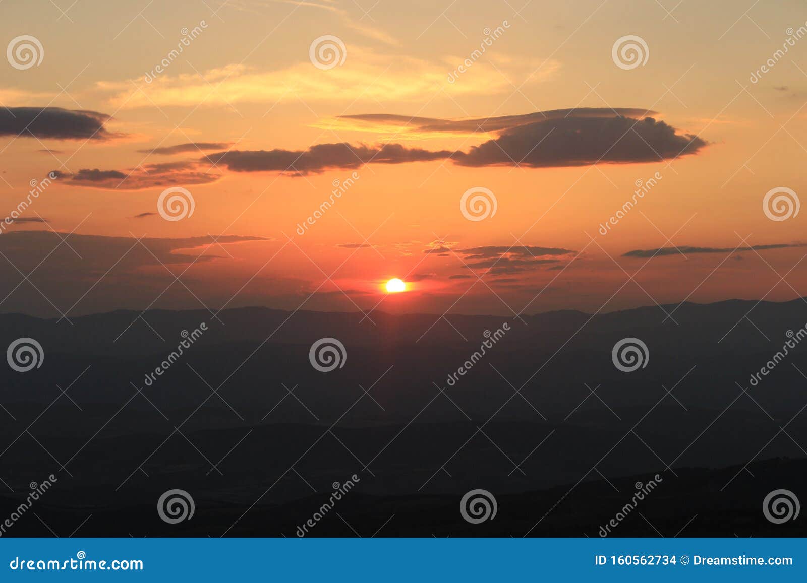 Sunset on a mountain stock photo. Image of rise, yellow - 160562734