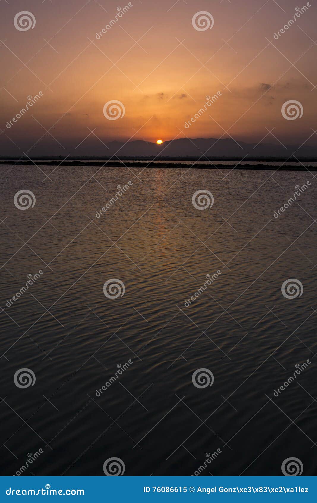 Sunset between Mountains and Lake Stock Image - Image of sunset, orange ...