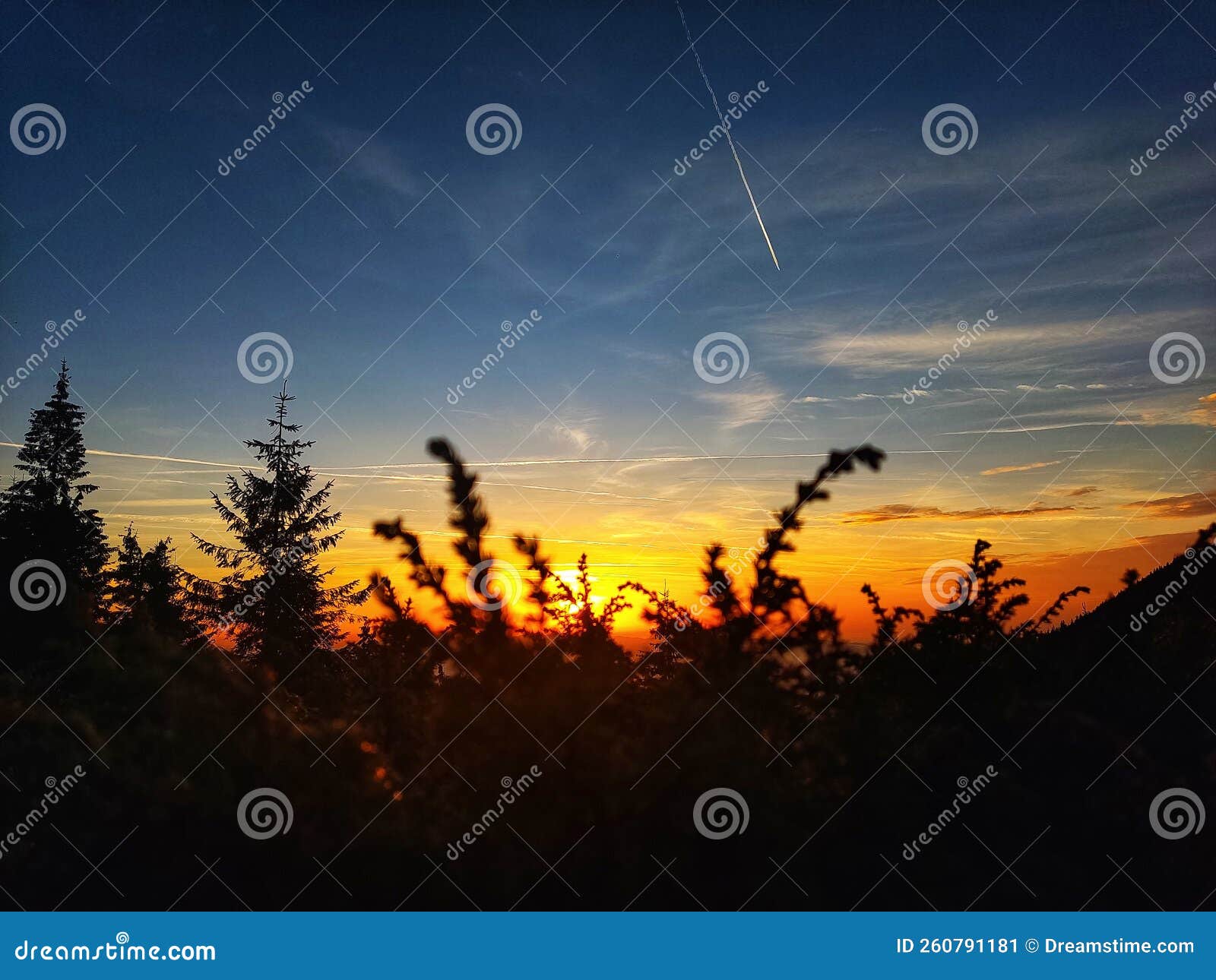 Sunset in the mountains stock image. Image of afterglow - 260791181