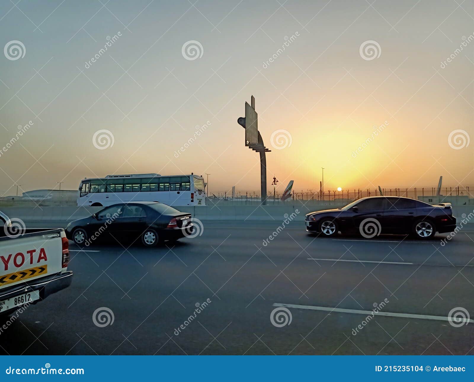 Sunset and the Normal Traffic on the Road Editorial Stock Image - Image ...