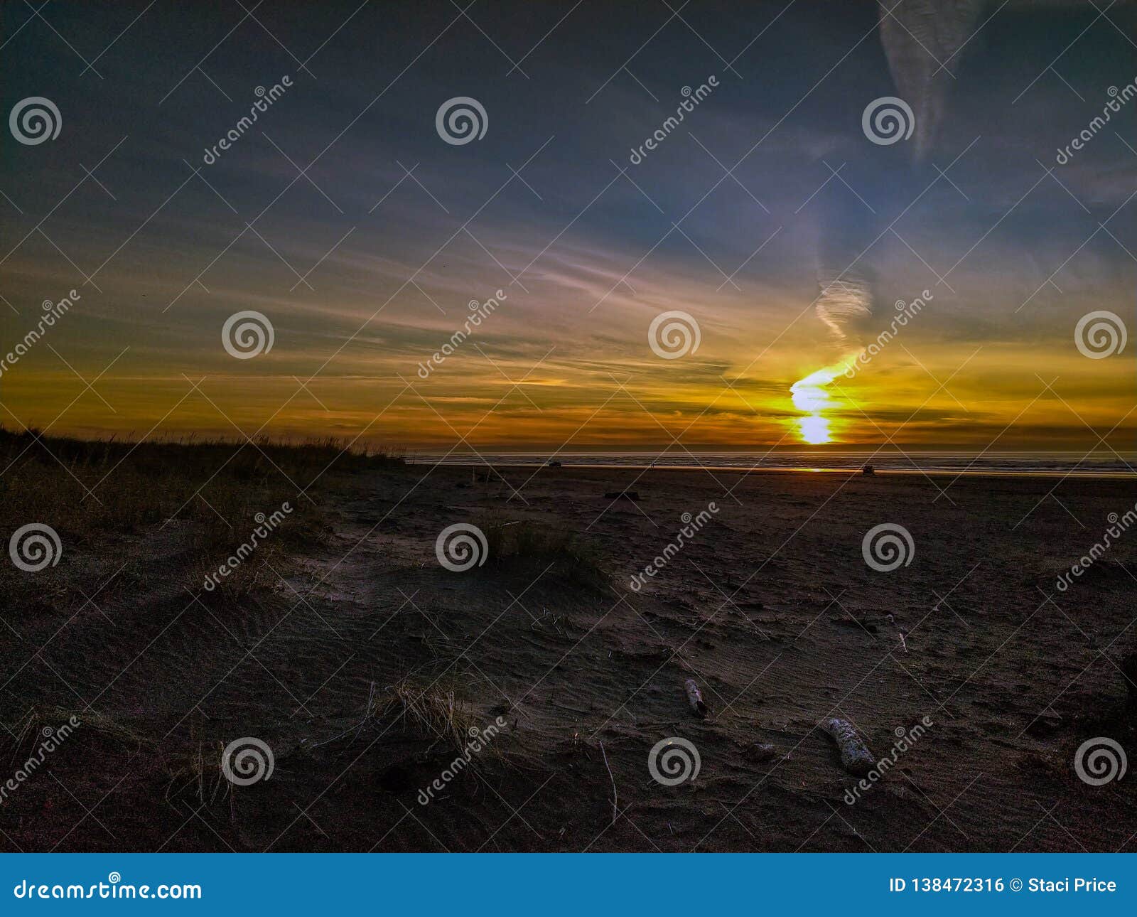 Sunset NW beach in January stock photo. Image of landscape - 138472316