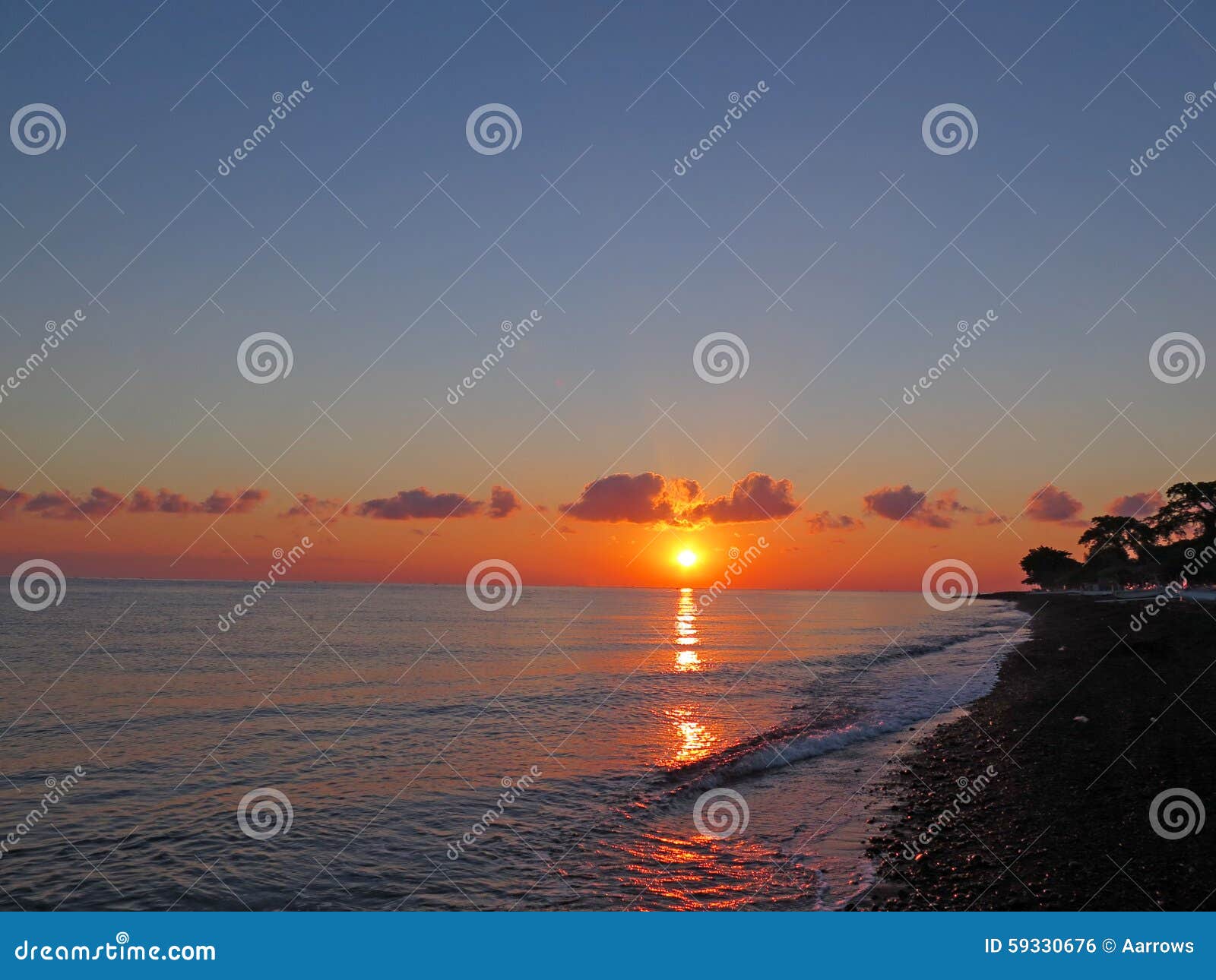 Sunset in ocean Bali stock photo. Image of landscape - 59330676