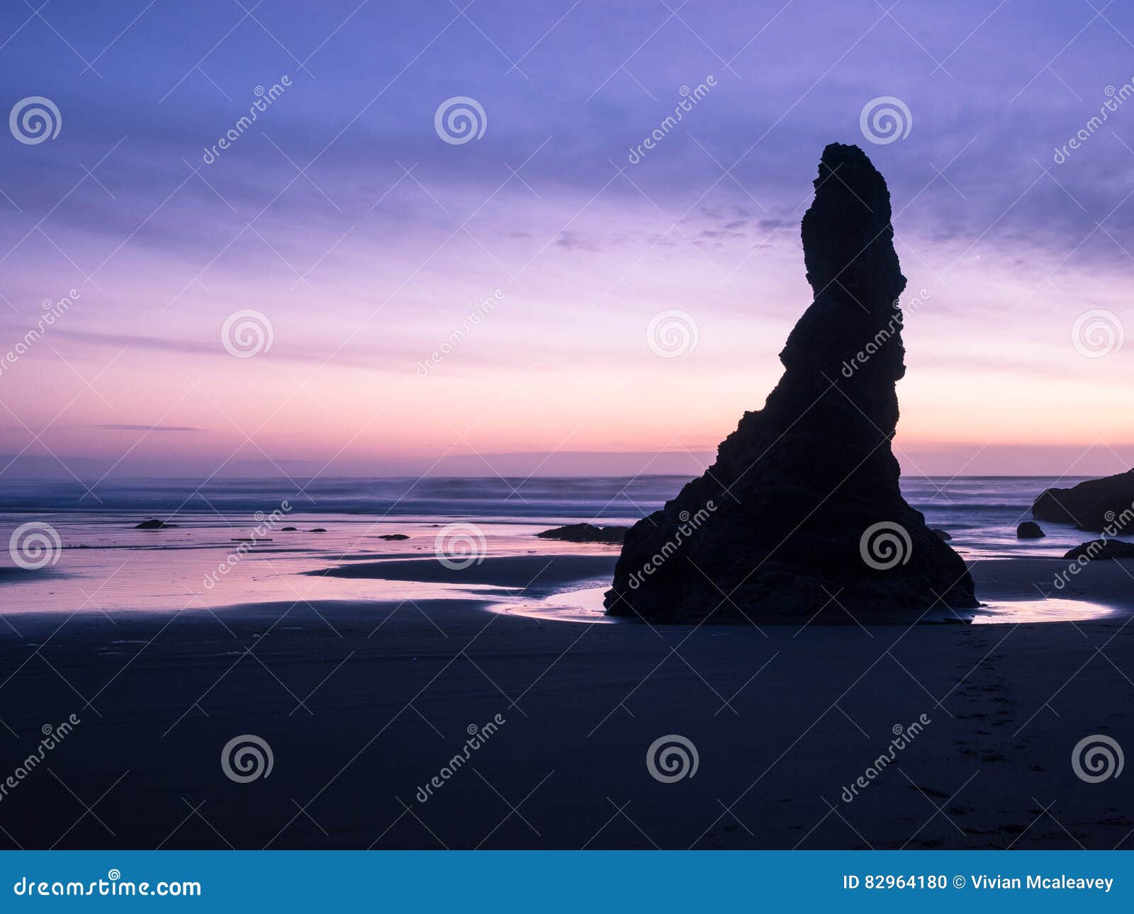 Sunset on Ocean Beach with Cliffs Stock Photo - Image of ocean, rocky ...